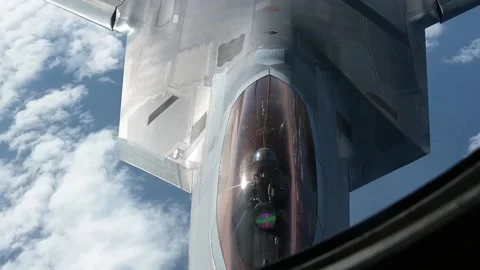 Air to air view of pilot flying F-22 Rap... | Stock Video | Pond5