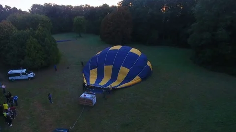 Air balloon envelope getting inflated on... | Stock Video | Pond5