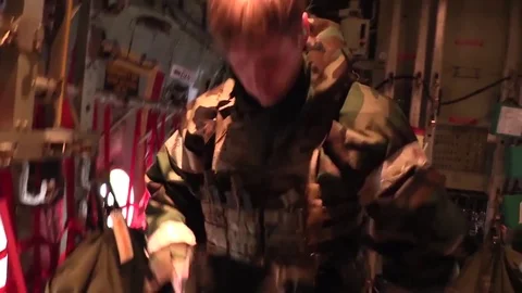 Air Commando dressing in gas mask for ch... | Stock Video | Pond5