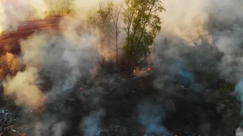 Air pollution caused by fire on a landfi... | Stock Video | Pond5