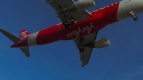 AirAsia Airbus A320 overhead landing | Stock Video | Pond5