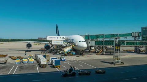the Airbus A380 unloading and loading of... | Stock Video | Pond5