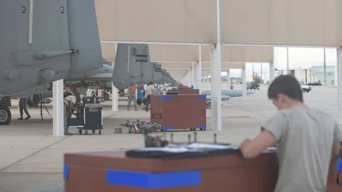 Aircraft maintainer completing paperwork... | Stock Video | Pond5