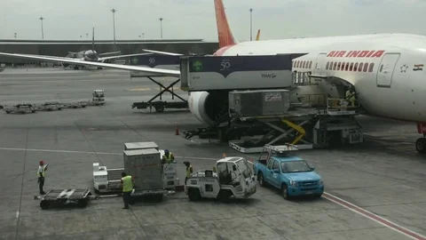 Aircraft prepare to take off and loading... | Stock Video | Pond5