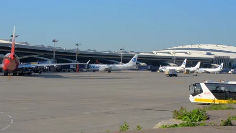 Aircraft stand at the air terminal gates... | Stock Video | Pond5