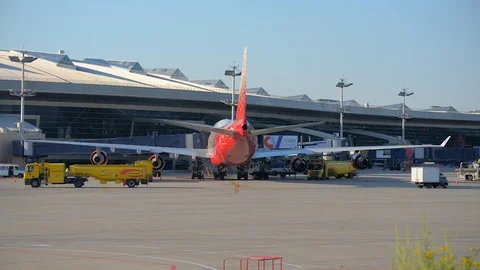 Aircraft stand at the air terminal gates... | Stock Video | Pond5