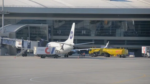 Aircraft stand at the air terminal gates... | Stock Video | Pond5