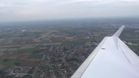Aircraft Wing View during Flight City Co... | Stock Video | Pond5