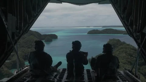 Airmen sitting on C-130 Hercules ramp lo... | Stock Video | Pond5