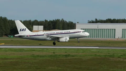 airplane airbus 319 sas retro livery lan... | Stock Video | Pond5