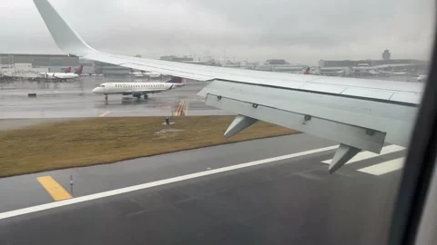 Airplane bumpy rough landing at LaGuardi... | Stock Video | Pond5