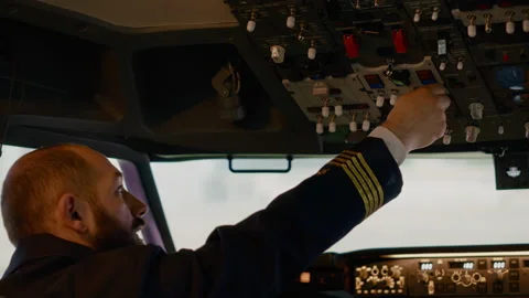 Airplane captain starting engine with po... | Stock Video | Pond5