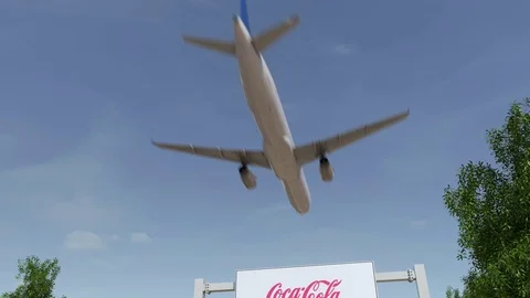 Airplane flying over advertising billboa... | Stock Video | Pond5