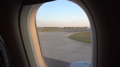 Airplane moving along the runway at airp... | Stock Video | Pond5