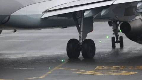 Airplane moving on the runway to airport... | Stock Video | Pond5