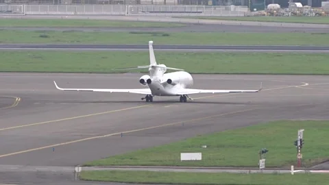 Airplane Taxiing Out at Airport - Back v... | Stock Video | Pond5