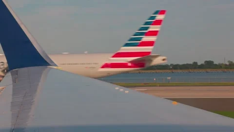 Airplane window on American Airlines air... | Stock Video | Pond5