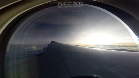 Airplane Wing through Window Cloudscape ... | Stock Video | Pond5