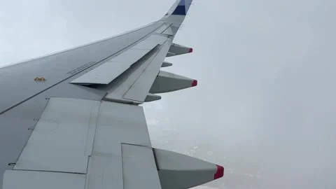 Airplane Wing Window View During Flight ... | Stock Video | Pond5