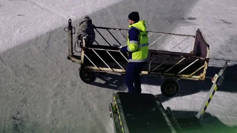 airport baggage air Baltic clerk loading... | Stock Video | Pond5