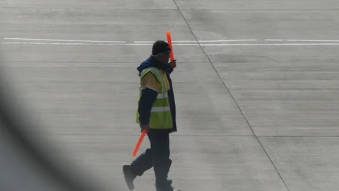 Airport ground marshall, marshalling air... | Stock Video | Pond5