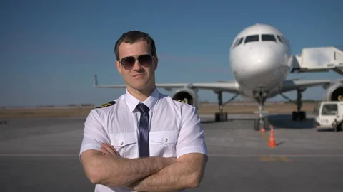 Airport, pilot, airplane. Portrait of co... | Stock Video | Pond5