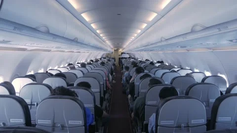 the aisle pathway inside plane cabin wit... | Stock Video | Pond5