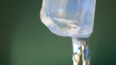Alcohol drips from the collection tube i... | Stock Video | Pond5