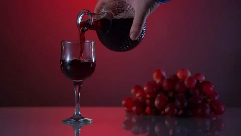 Alcohol. Red vine with fresh grapes on t... | Stock Video | Pond5