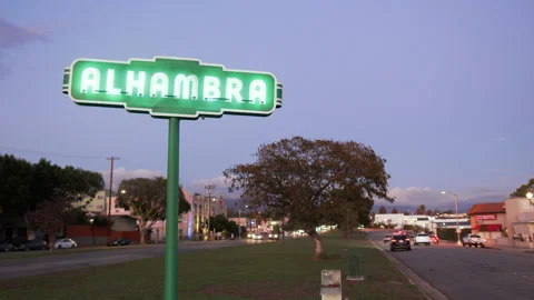 Alhambra Neon Sign Sunset with Car Traff... | Stock Video | Pond5