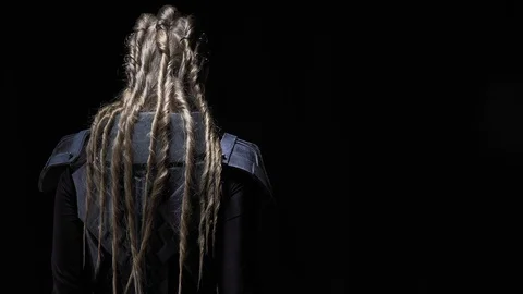 An alien woman with face paint, dreadloc... | Stock Video | Pond5