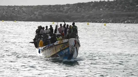 Almost 700 people arrive on the Canary I... | Stock Video | Pond5