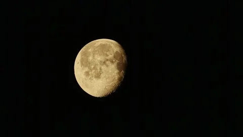 Almost full moon in the night sky. | Stock Video | Pond5