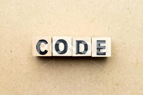 Alphabet letter block in word code on wood background ~ Hi Res #154462958