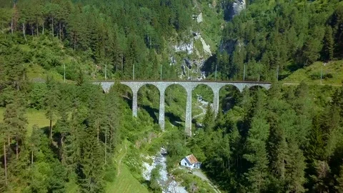 Alpine trains. Mountain bridge. Viaduct.... | Stock Video | Pond5