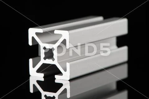 Aluminium profile sample Aluminium profile sample isolated on black ...