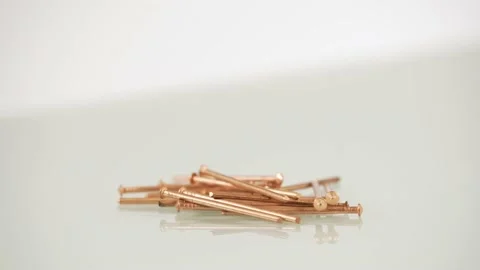 Aluminum rivets rotating on white backgr... | Stock Video | Pond5