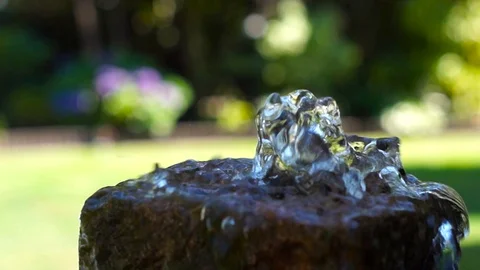An amazing close up of a fountain pourin... | Stock Video | Pond5