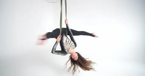 Amazing upside down split, woman is spin... | Stock Video | Pond5