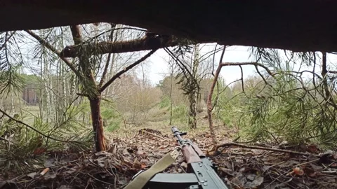 Ambush in forest with Kalashnikov assaul... | Stock Video | Pond5