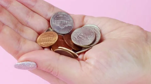 American cent coins falling down into th... | Stock Video | Pond5