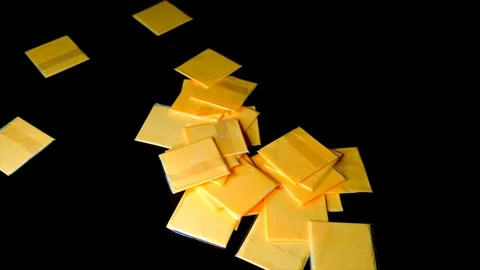 american cheese slices falling with a bl... | Stock Video | Pond5
