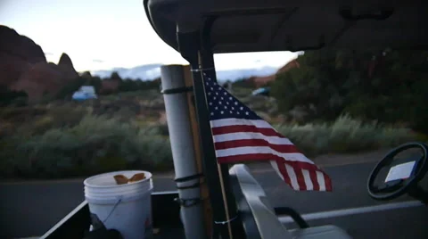 american flag on camground host cart | Stock Video | Pond5