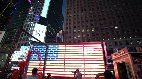 American Flag in crowded Times Square in... | Stock Video | Pond5
