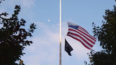 American Flag At Half Mast Waving Beside... | Stock Video | Pond5