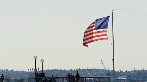 American flag waving in the air and tour... | Stock Video | Pond5