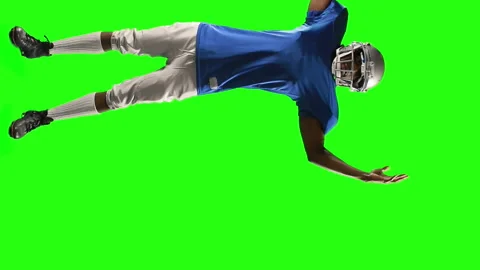 American football player on green screen | Stock Video | Pond5