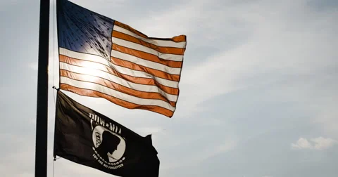 American POW flag blowing in the wind - ... | Stock Video | Pond5
