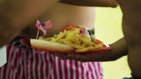 American theme party. Eating fast food w... | Stock Video | Pond5