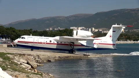 Amphibious aircraft Be-200ES leaves wate... | Stock Video | Pond5